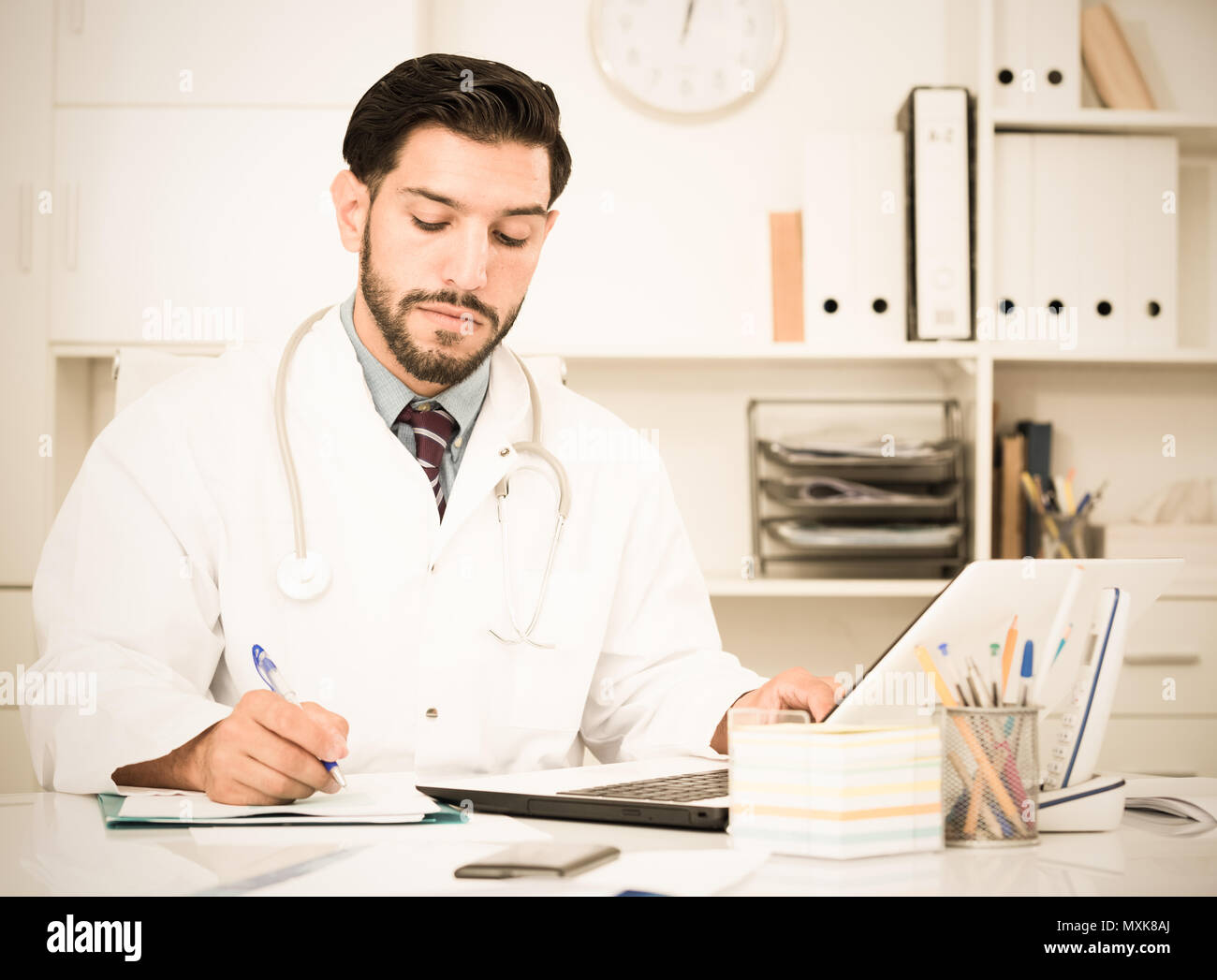 Clinic reception latino hi-res stock photography and images - Alamy
