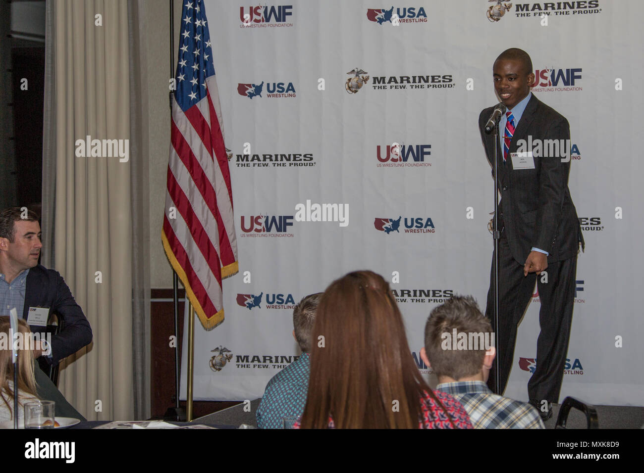 Benjamin Jackson, motivational speaker, speaks to guests during the USA ...
