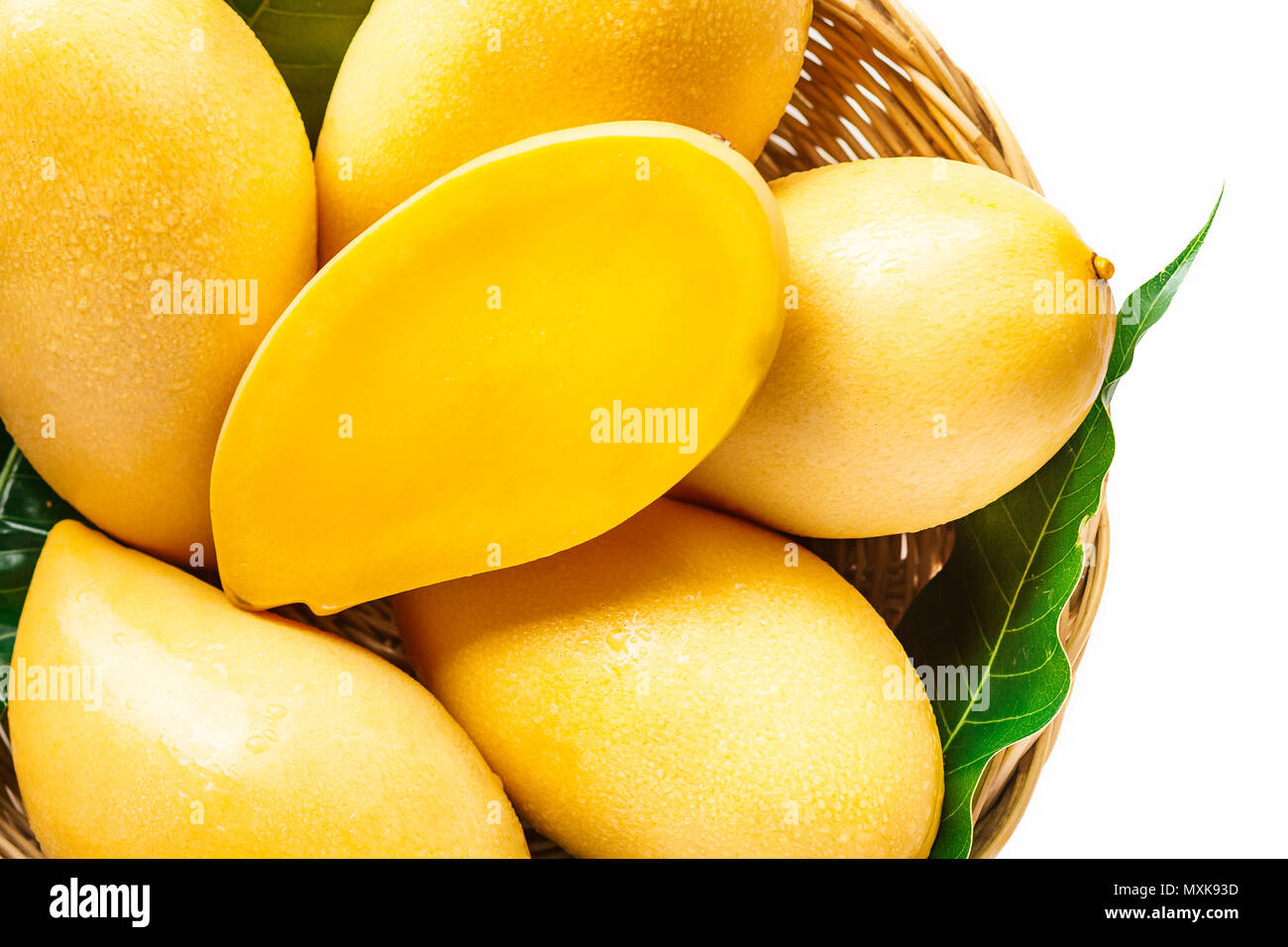Yellow Mango isolated background Stock Photo - Alamy