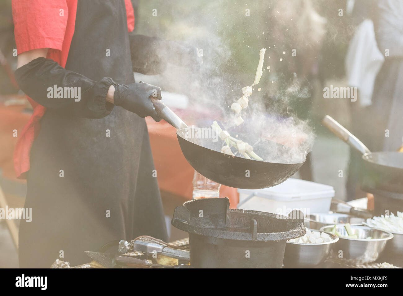 Chef throwing food hi-res stock photography and images - Alamy