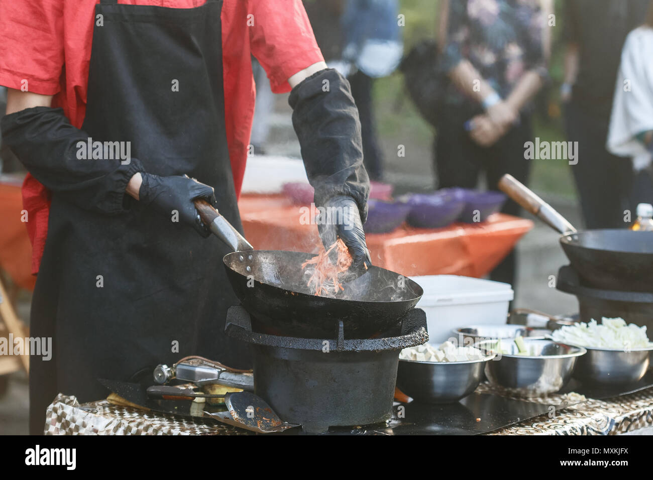 Asian chef cooking in outdoor hi-res stock photography and images - Alamy