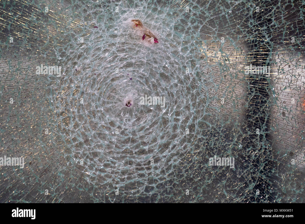 broken bulletproof glass close up detail Stock Photo - Alamy