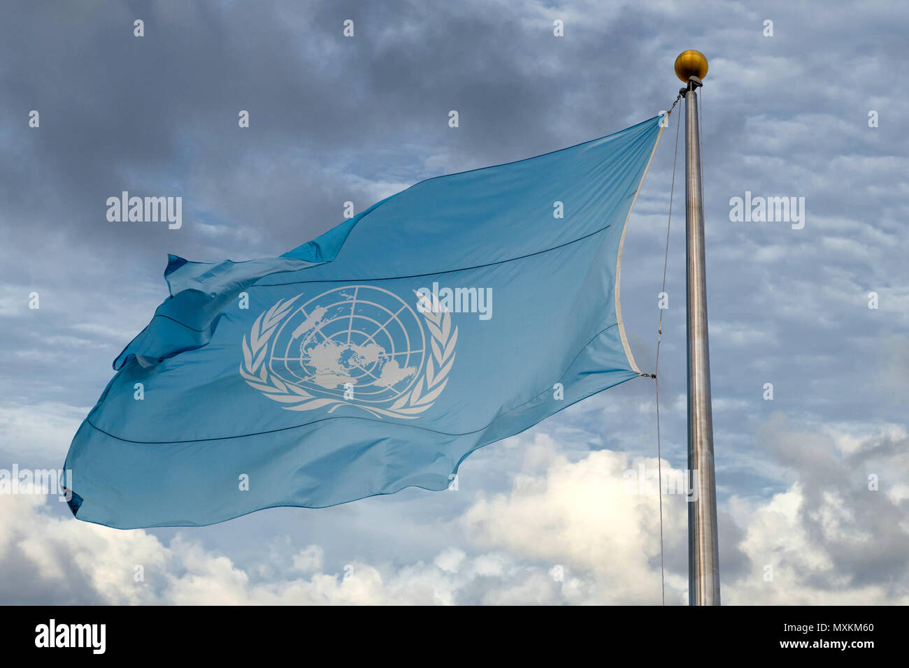 Waving united nations UN flag in the deep blue sky background Stock ...
