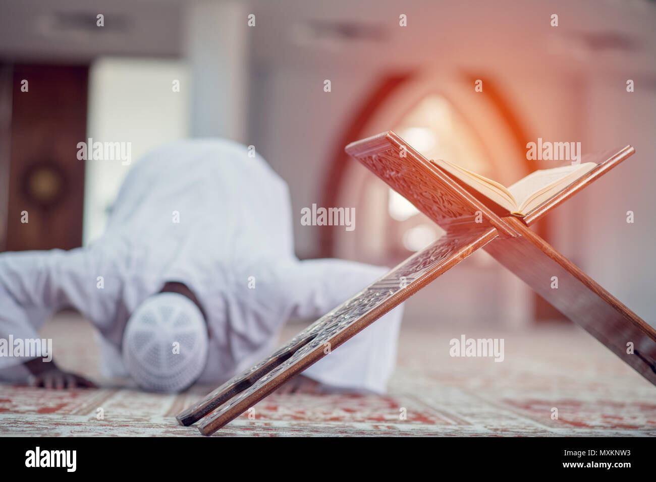 African Muslim Man Making Traditional Prayer To God While Wearing ...