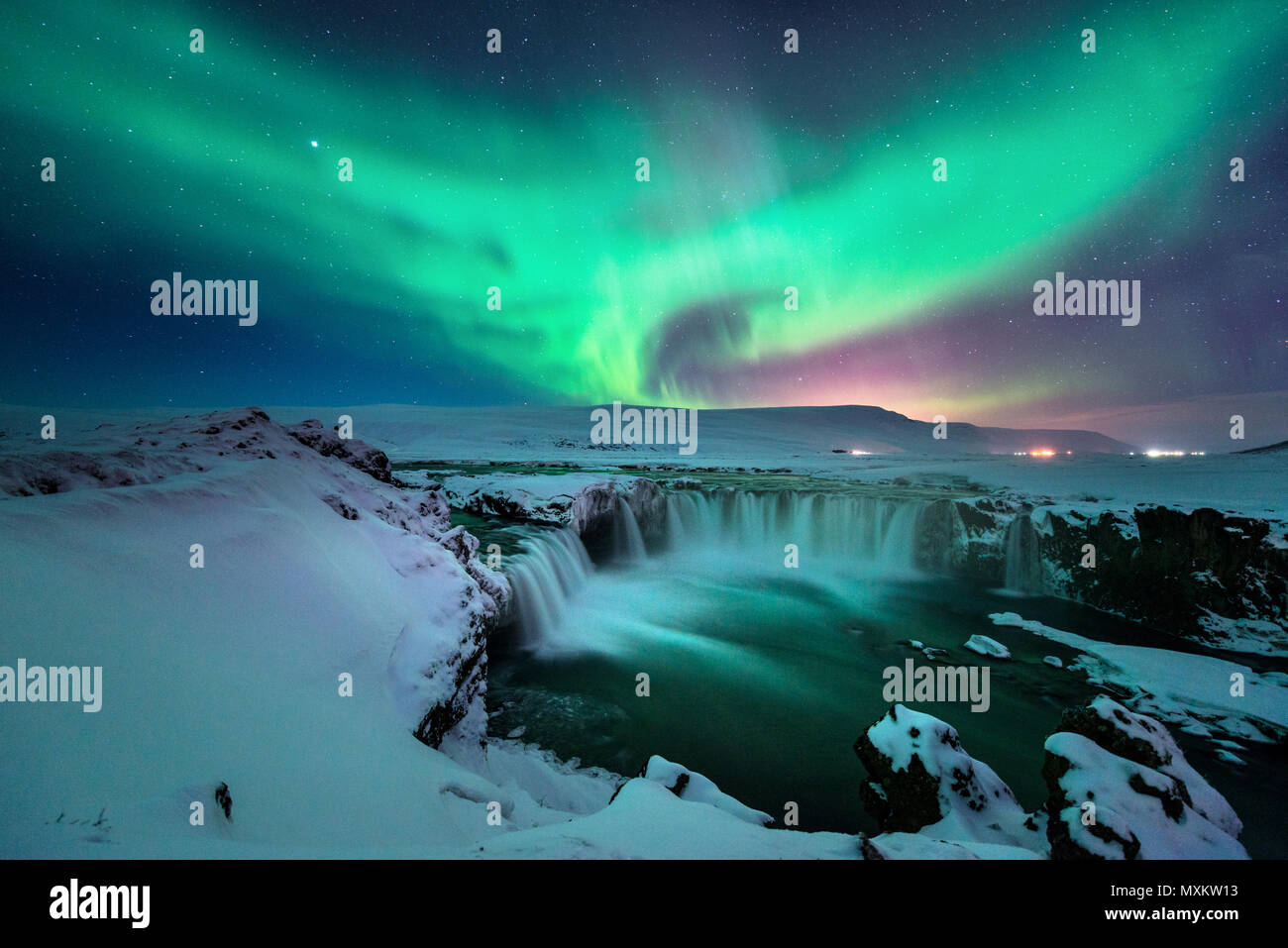 stunning aurora shape like phoenix bird appears above the landscape of ...