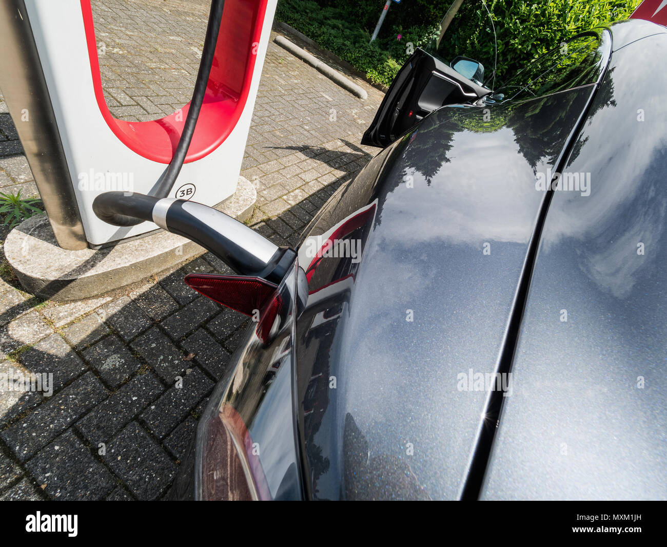 URMOND, NETHERLANDS - MAY 31, 2018. TESLA station supercharger in ... URMOND, NETHERLANDS - MAY 31, 2018. TESLA station supercharger in ...