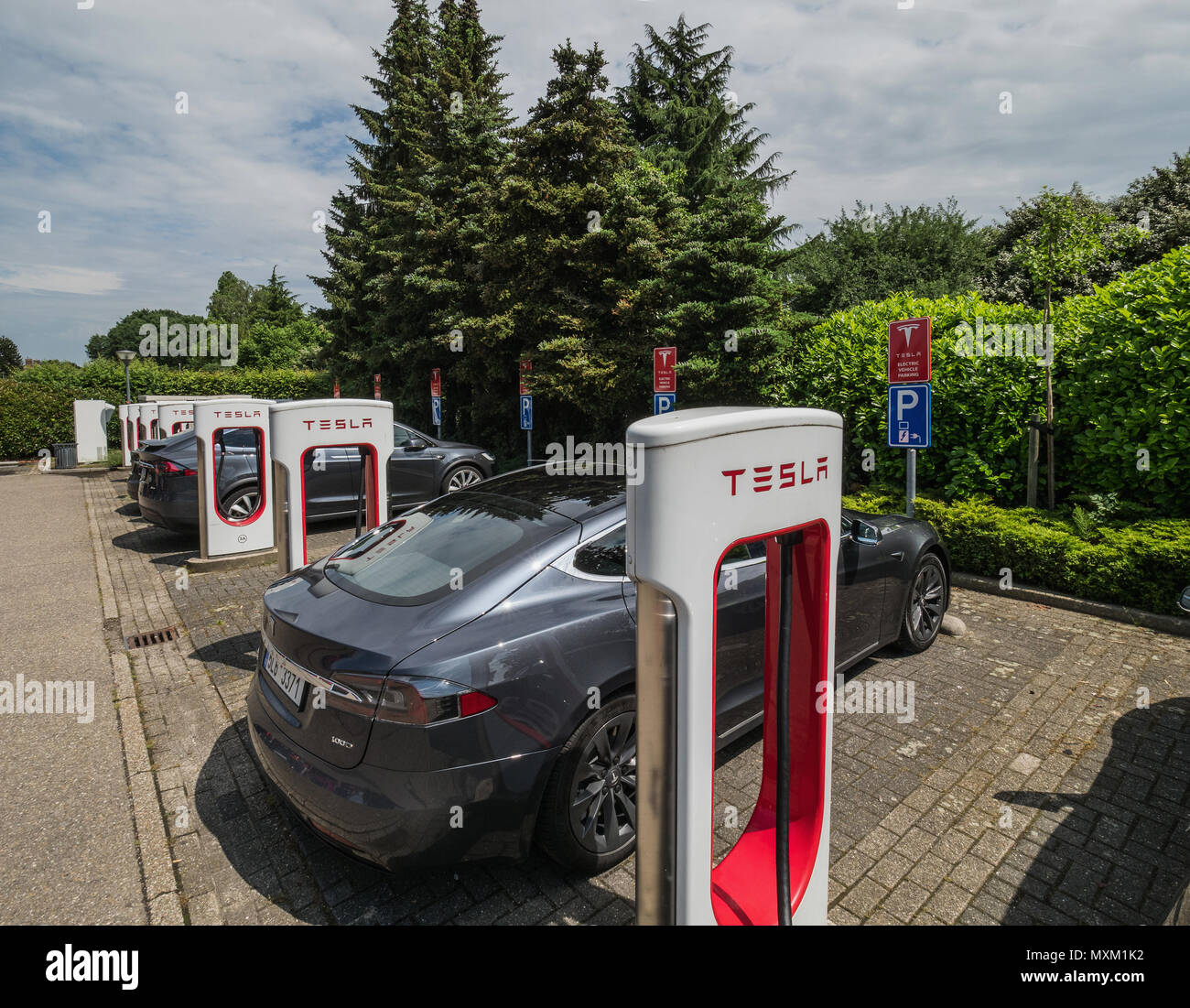URMOND, NETHERLANDS - MAY 31, 2018. TESLA station supercharger in ... URMOND, NETHERLANDS - MAY 31, 2018. TESLA station supercharger in ...