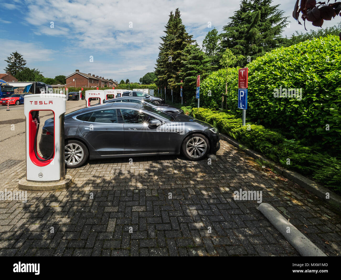 URMOND, NETHERLANDS - MAY 31, 2018. TESLA station supercharger in ... URMOND, NETHERLANDS - MAY 31, 2018. TESLA station supercharger in ...
