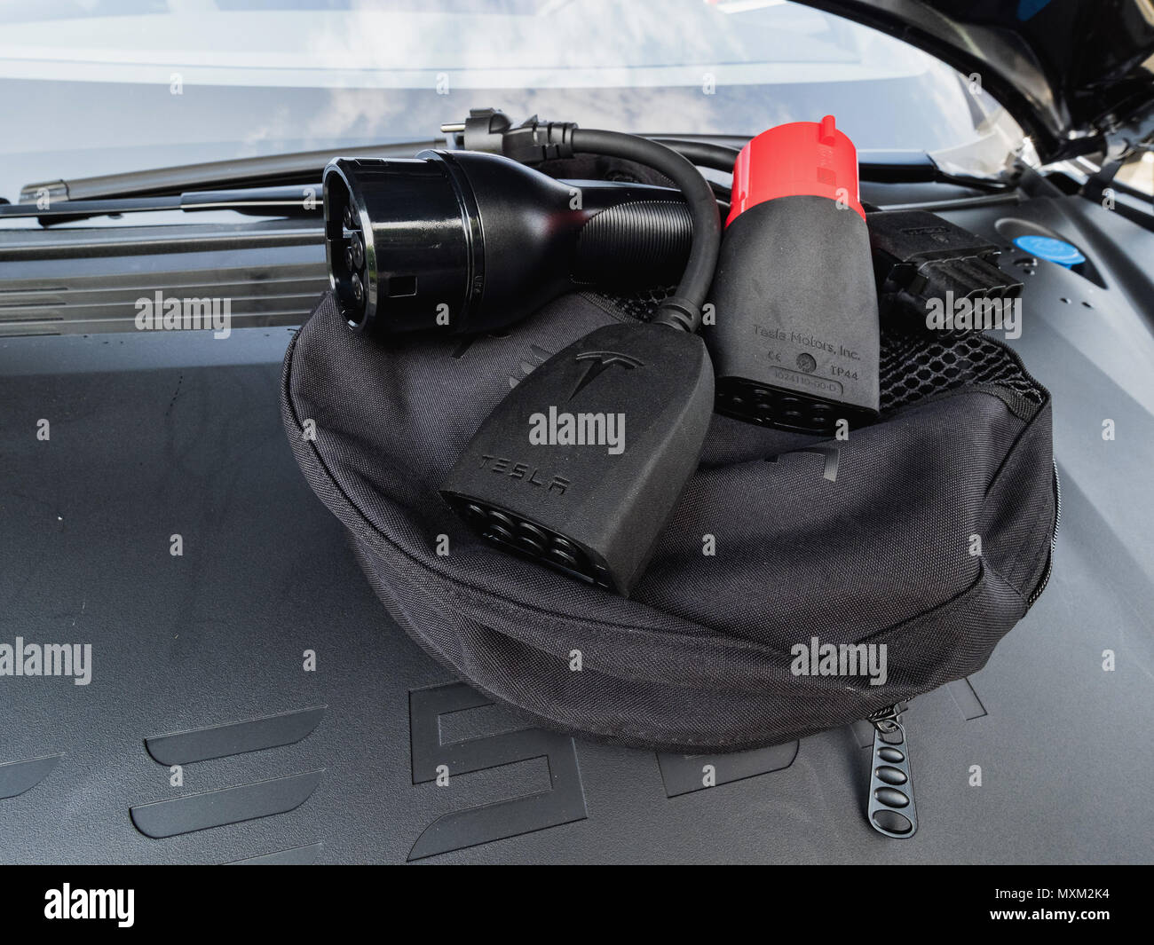 URMOND, NETHERLANDS - MAY 31, 2018. Charging cable for electric motor ...