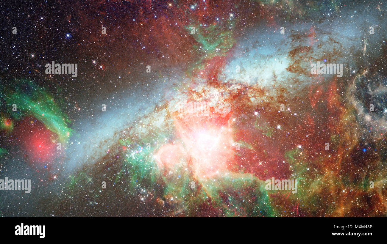 Stars, dust and gas nebula in galaxy. Elements of this image furnished ...