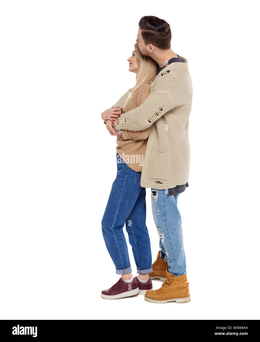 Side view of a stylish couple. beautiful friendly girl and guy together ...