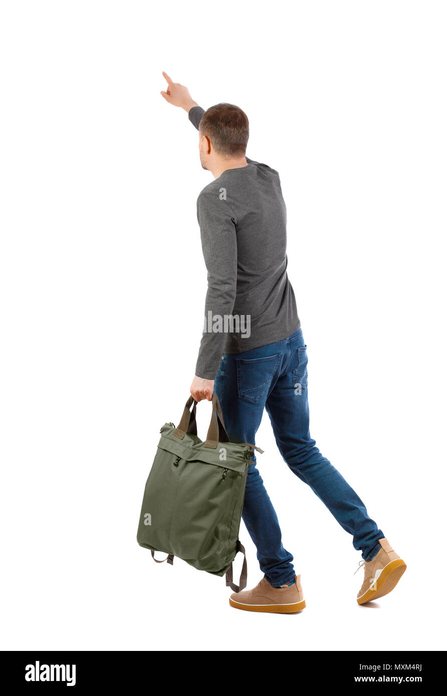 Back view of a walking man with a bag pointing his hand up. backside ...