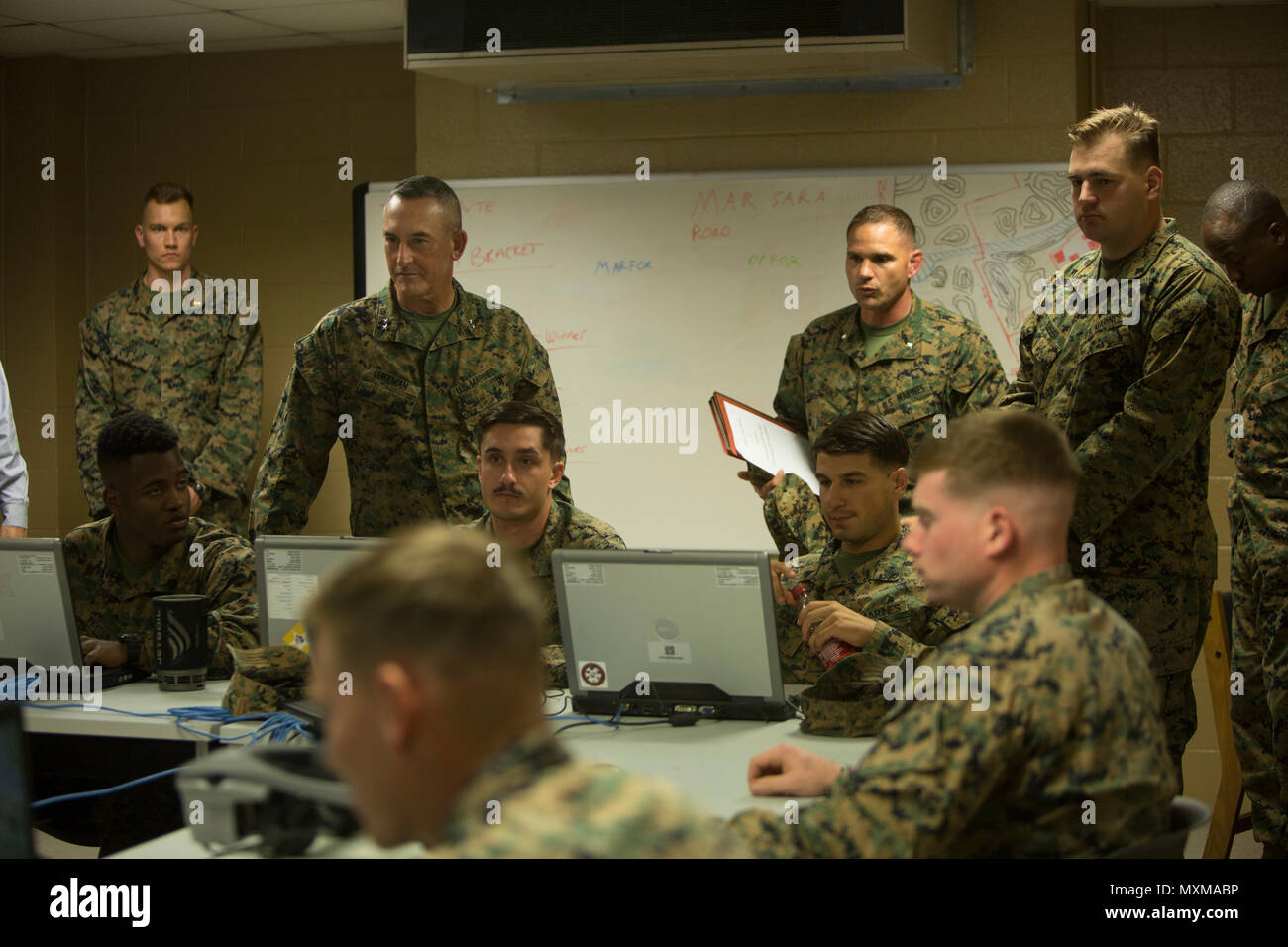U.S. Marine Corps Maj. Gen. James W. Lukeman, left, commanding general ...