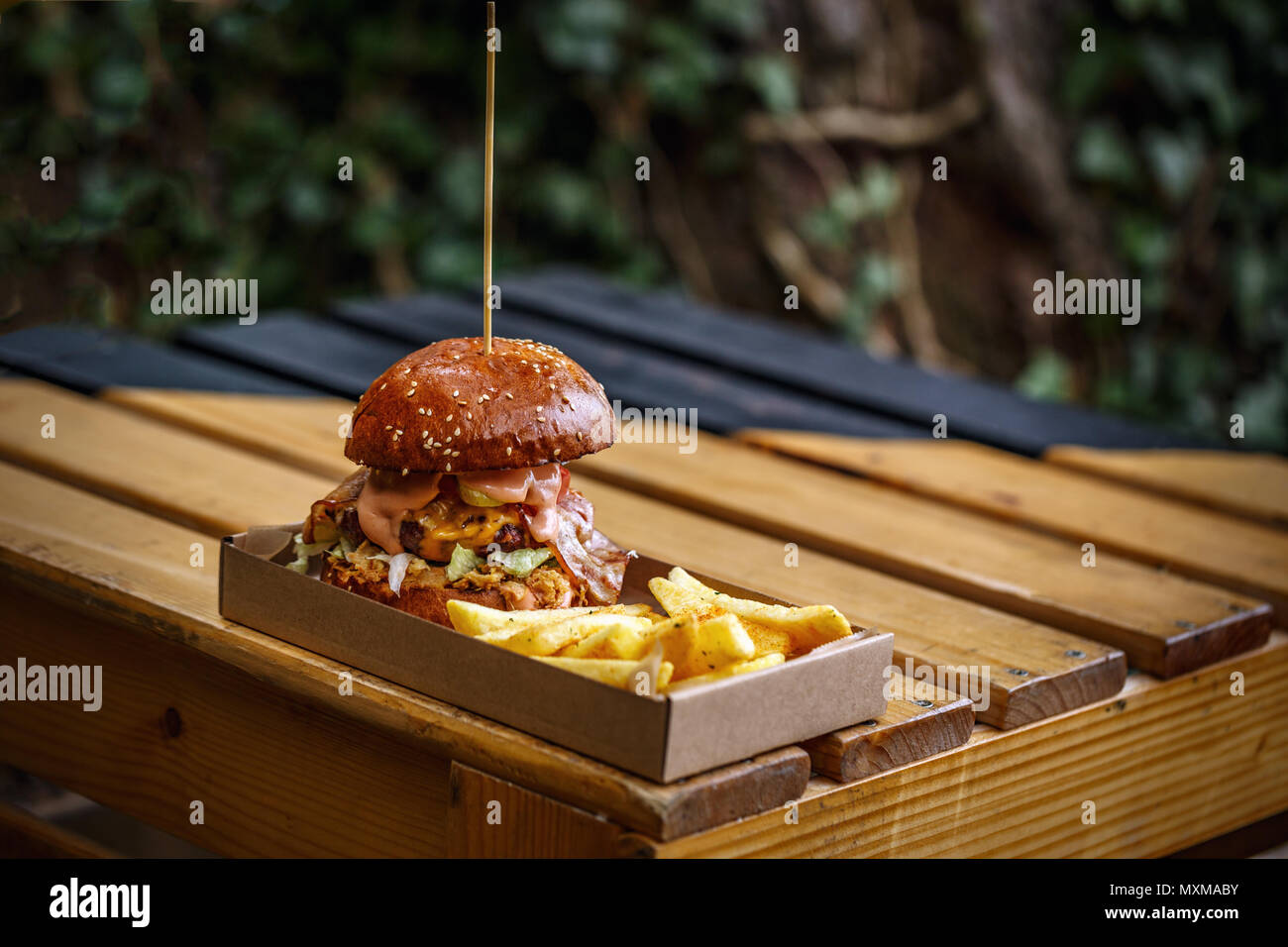 Street food grilled beef burger and fries Stock Photo - Alamy