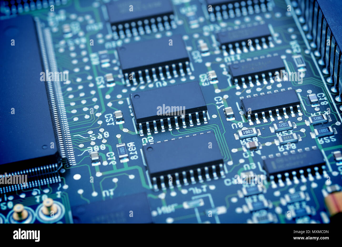 Microchips on a circuit board Stock Photo - Alamy