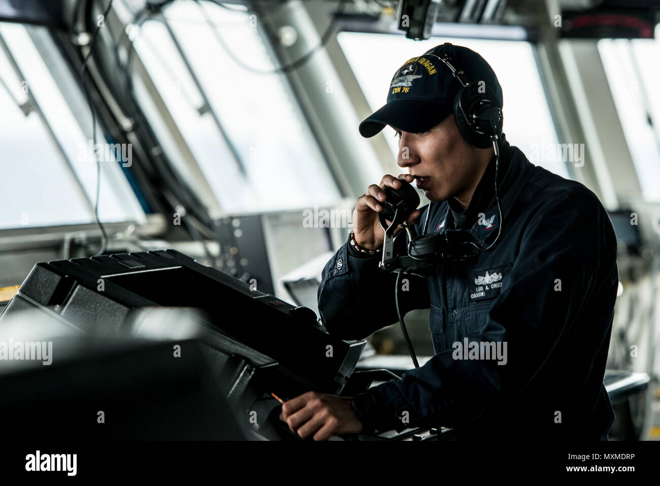 PHILIPPINE SEA (Nov. 19, 2016) Petty Officer 3rd Class (SW) Luis Cruz ...