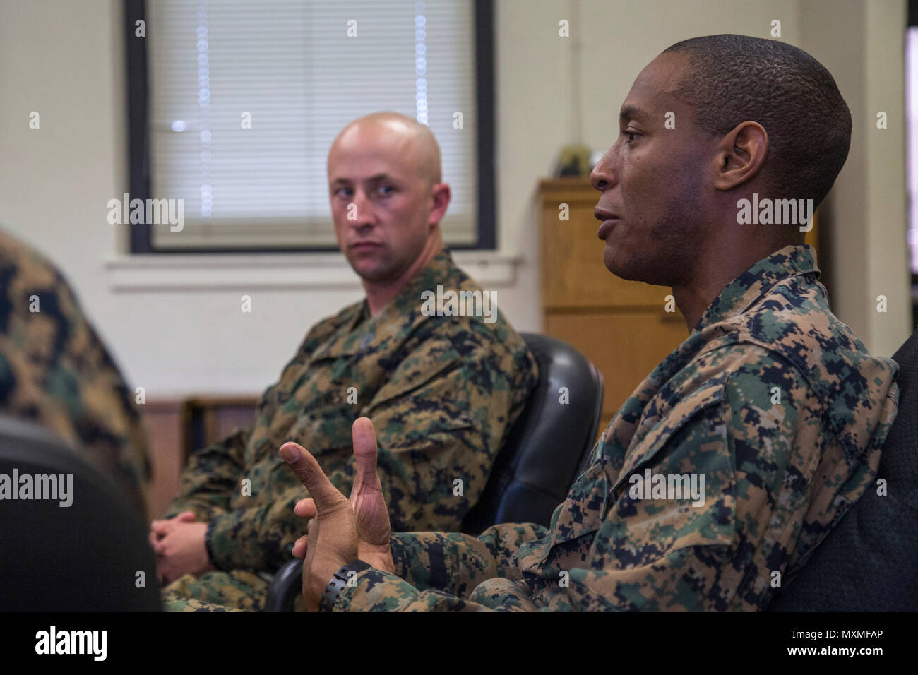 U.S. Marine Corps Staff Sgt. Ryan Lewis, a chief drill instructor with ...