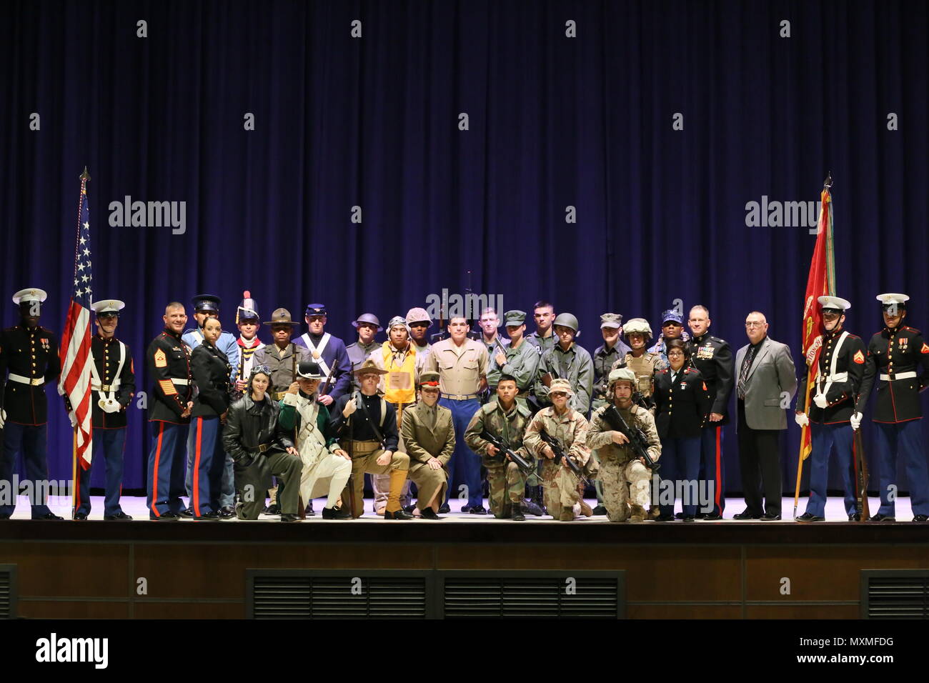 Participants of the annual Historic Uniform Pageant stand on stage ...