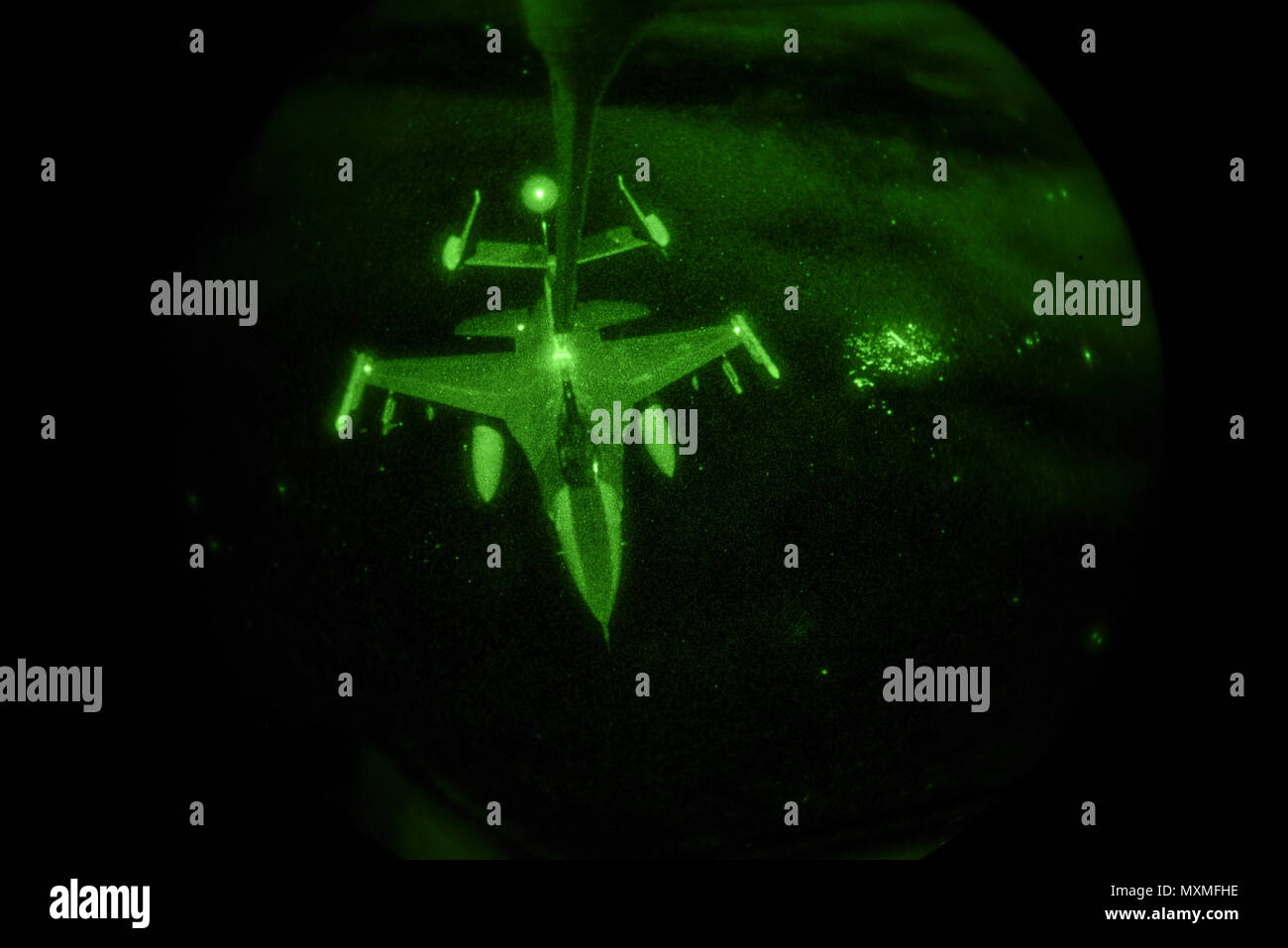 An F-16 Falcon refuels midair during exercise Combat Raider at the ...