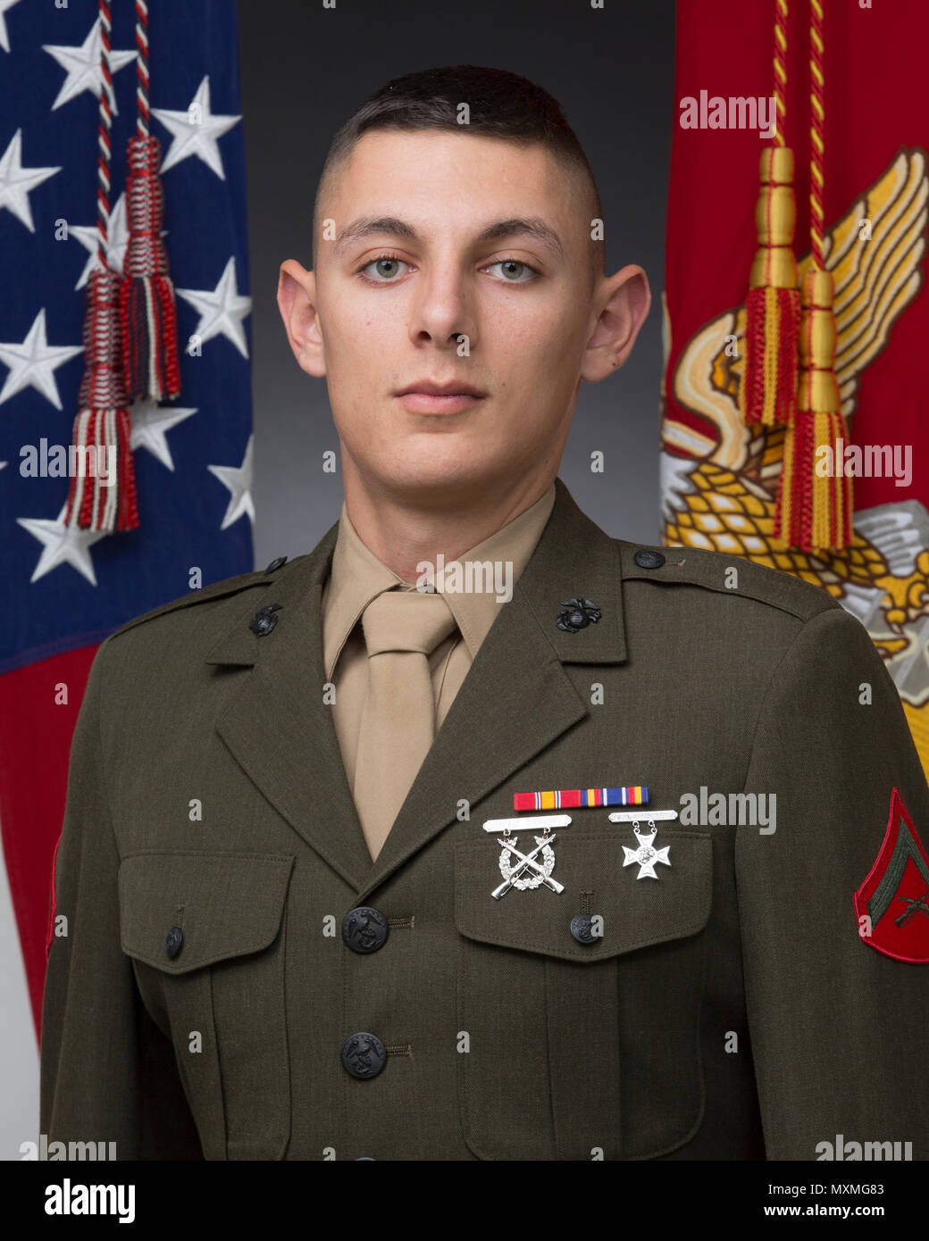 Lance Corporal J.M. Soto poses for a command portrait after he wins ...