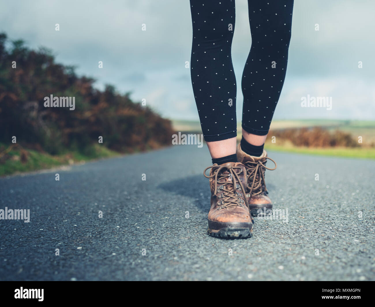 Woman in boots hi-res stock photography and images - Alamy