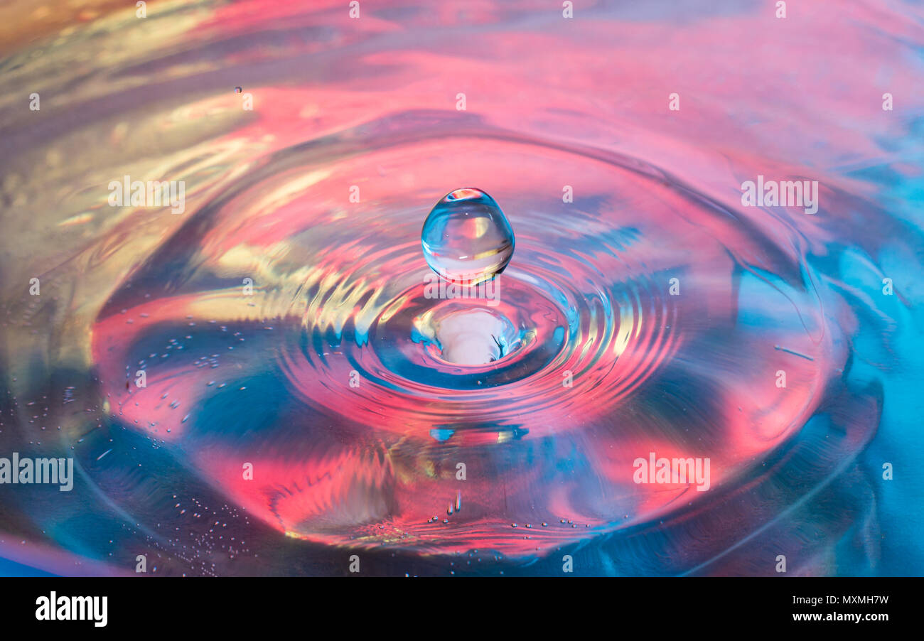 colorful water drop splash Stock Photo - Alamy