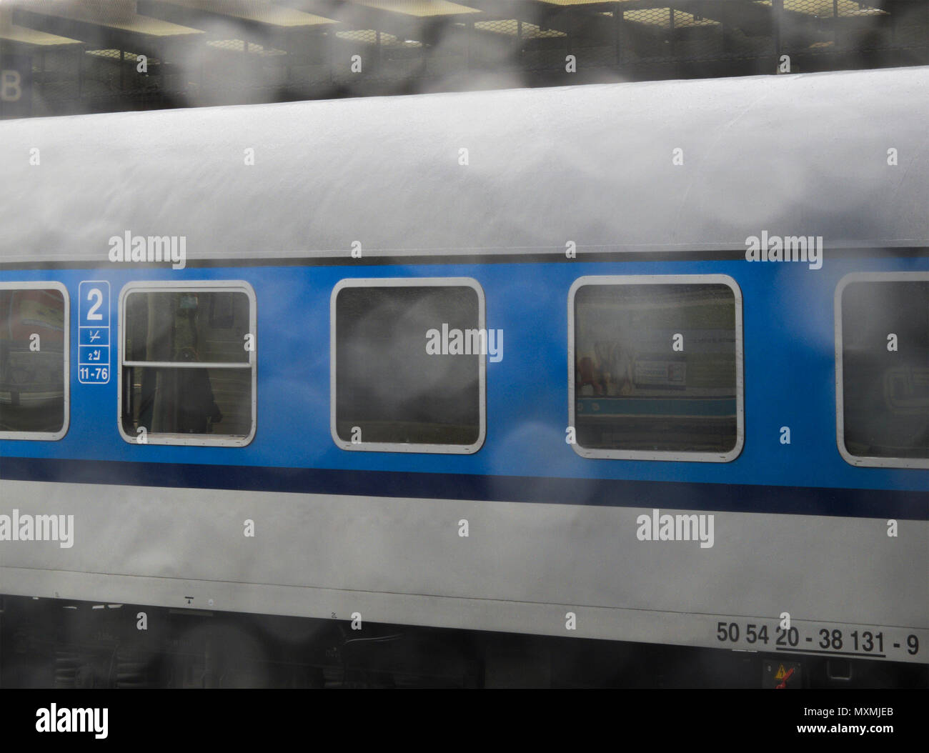 Train through rainy window hi-res stock photography and images - Alamy