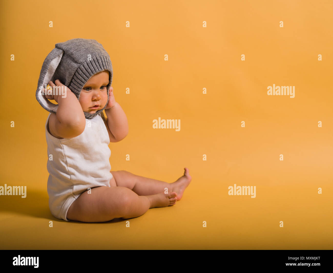 Rabbit wearing hat hi-res stock photography and images - Alamy