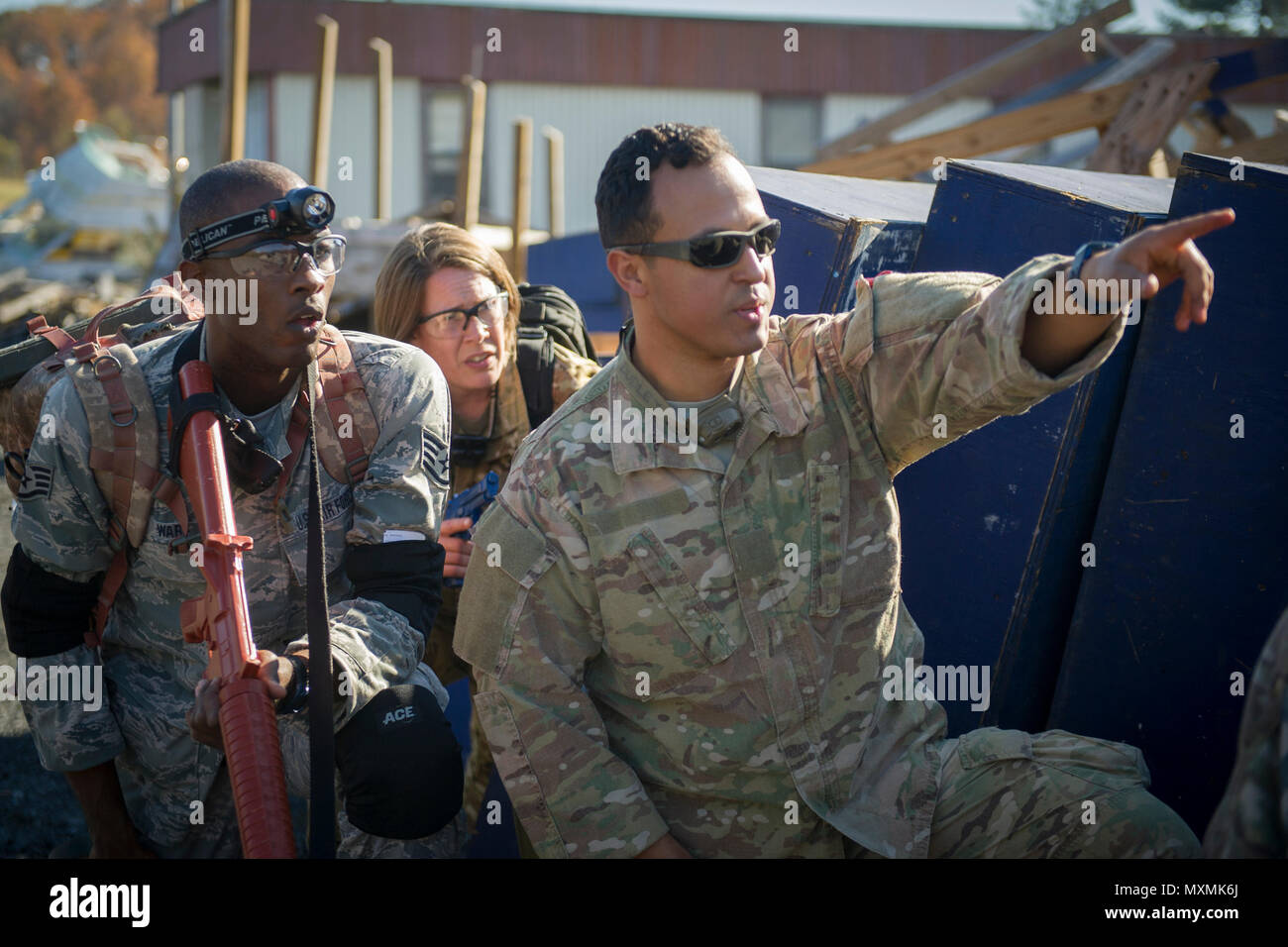 Army and Air Force medics coordinate during a simulated attack scenario ...