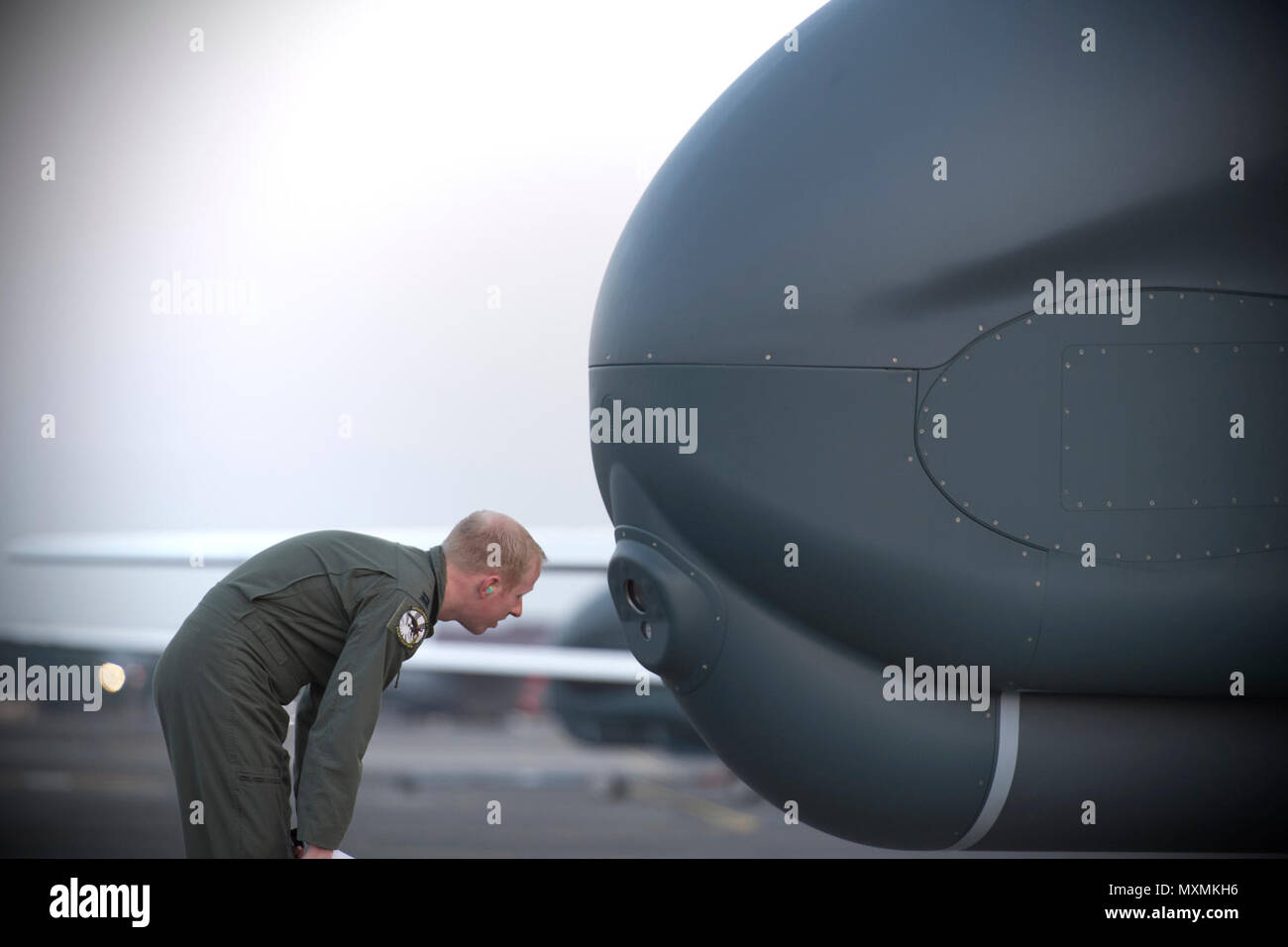 Capt. Mark, 69th Reconnaissance Group Detachment 1 RQ-4 pilot, inspects ...