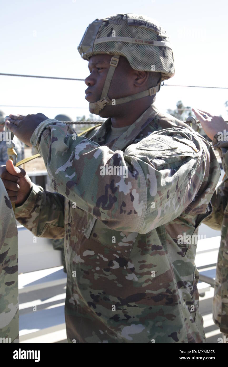 U.S. Army Sgt. James Thomas a member of the 301st Psychological Operations Company, takes part ...