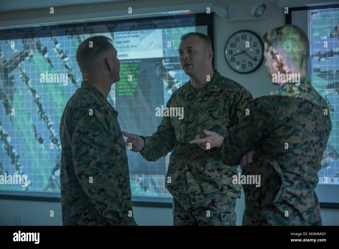 U.S. Marine Corps Lt. Col. Marcus J. Mainz, left, commanding officer ...