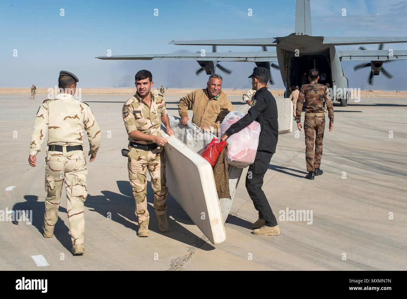 Members of the Iraqi military arrive to Qayyarah West Airfield, Iraq ...