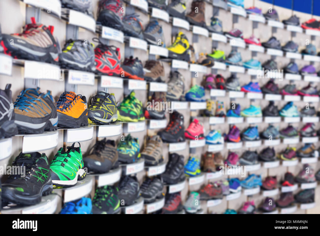 Image of sport colorful shoes on showcase of sports shop Stock Photo ...