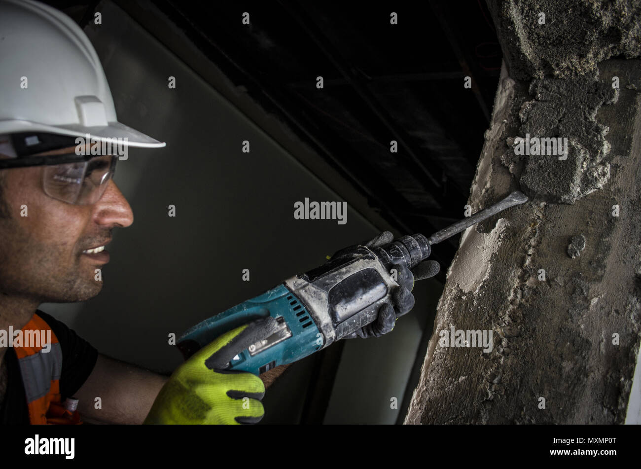 Worker using pneumatic hammer hi-res stock photography and images - Alamy
