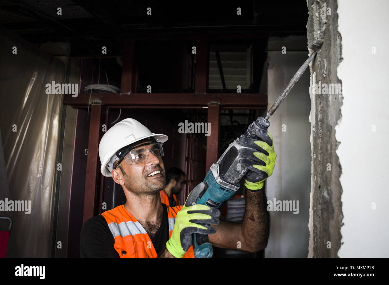 Worker using pneumatic hammer hi-res stock photography and images - Alamy
