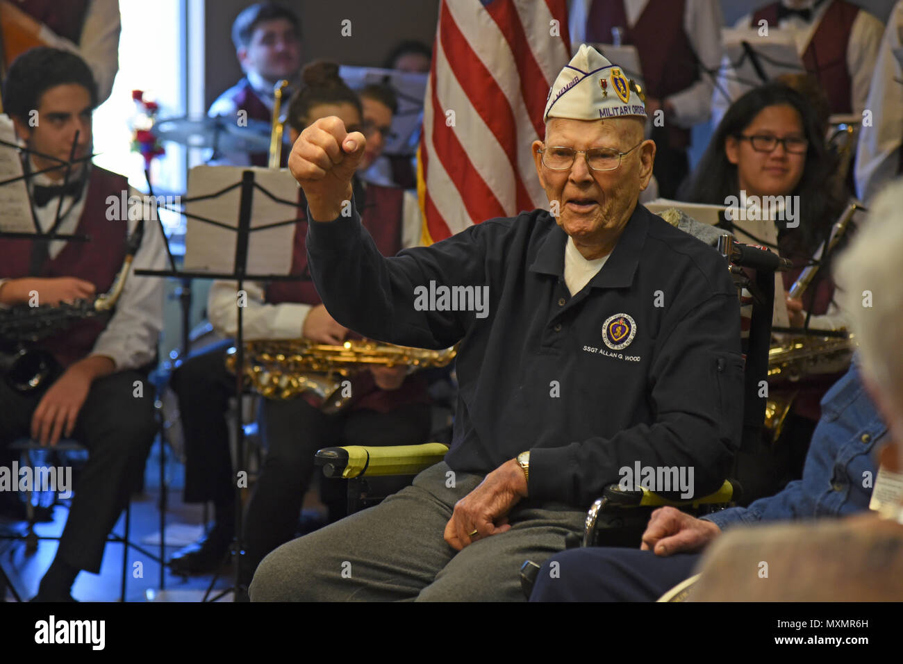 Retired Staff Sgt. Allen G. Wood, United States Army, celebrates during ...