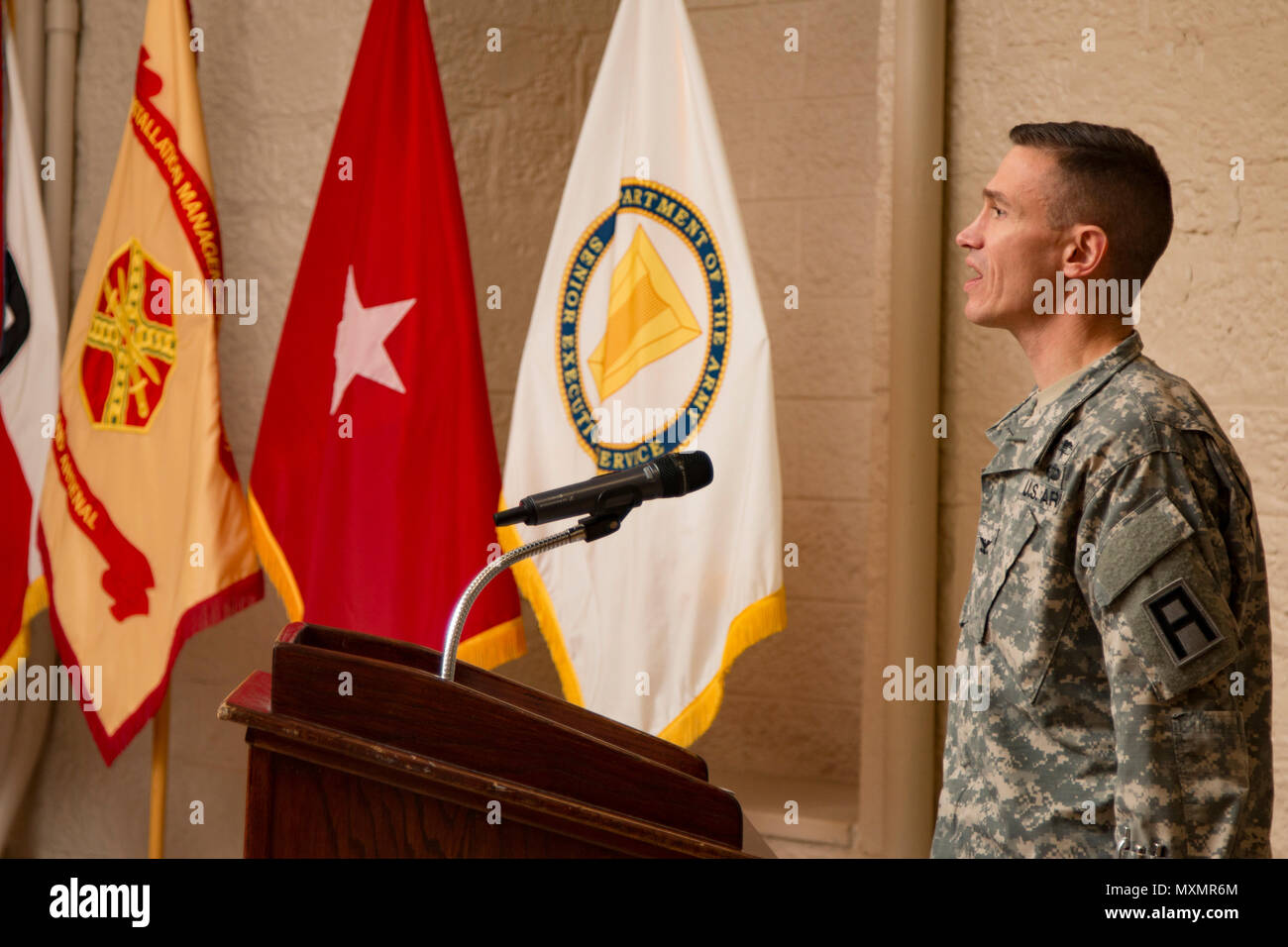 Col. Vincent Barnhart, First Army’s command surgeon, sings the National ...