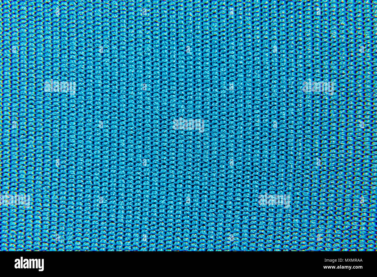 image background of a cloth of blue color close-up of an interlacing ...
