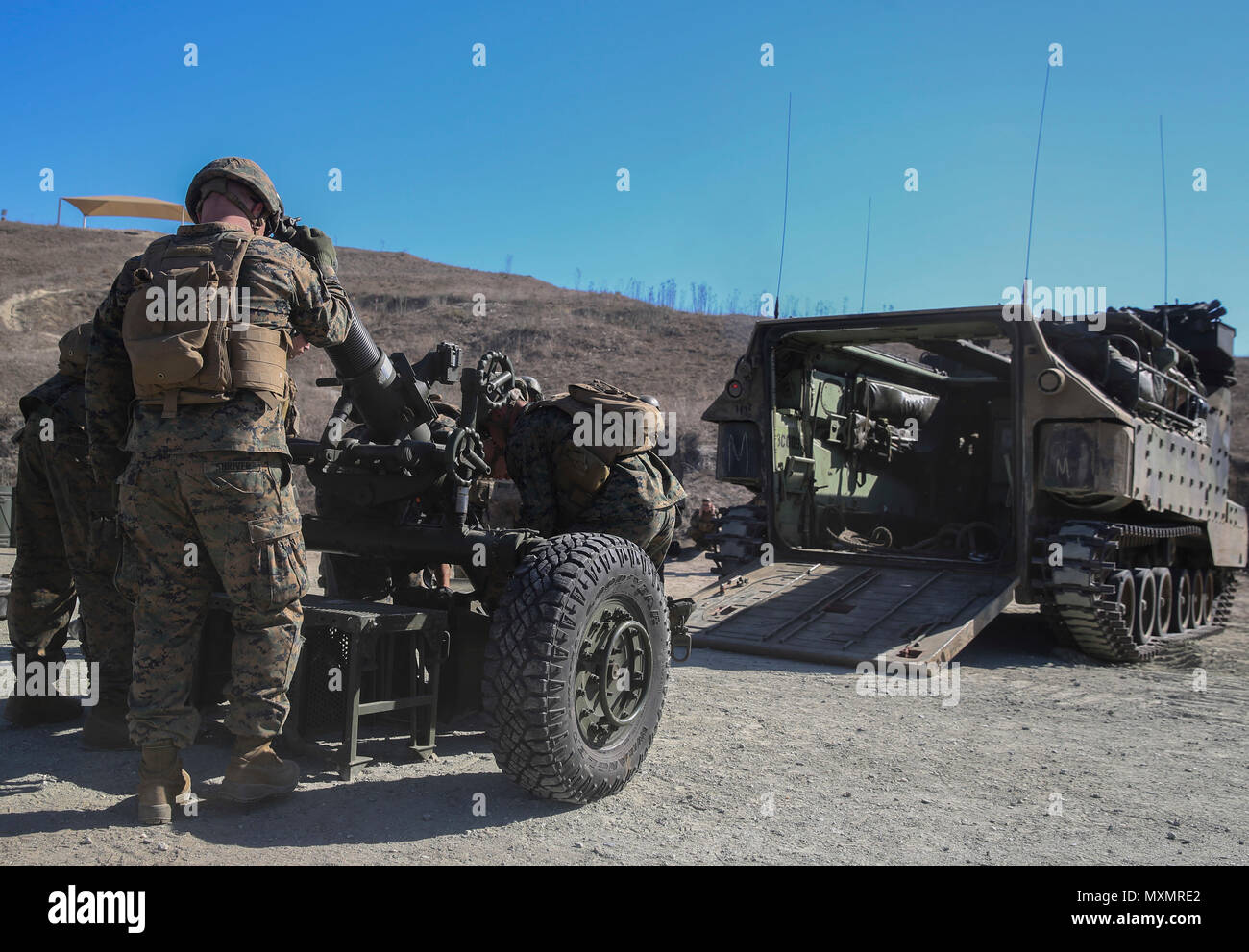 Marines with Battery B, 1st Battalion, 11th Marine Regiment, prepare an ...