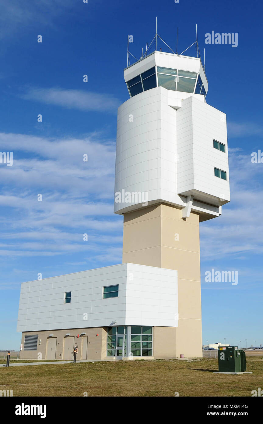 The air traffic control tower sits near the flight line at Minot Air ...