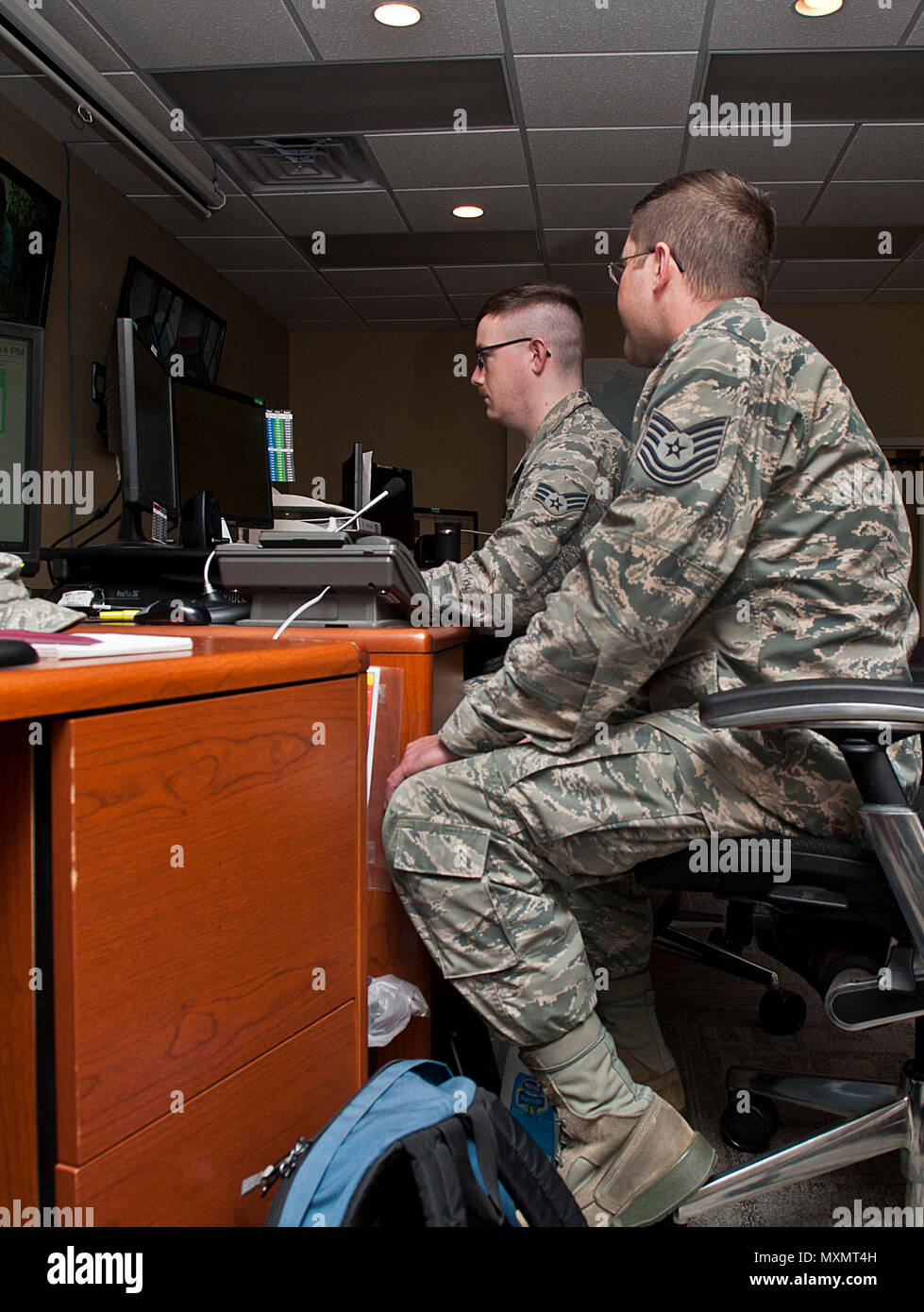 (From left) Senior Airman Benjamin Haun, 5th Maintenance Group ...