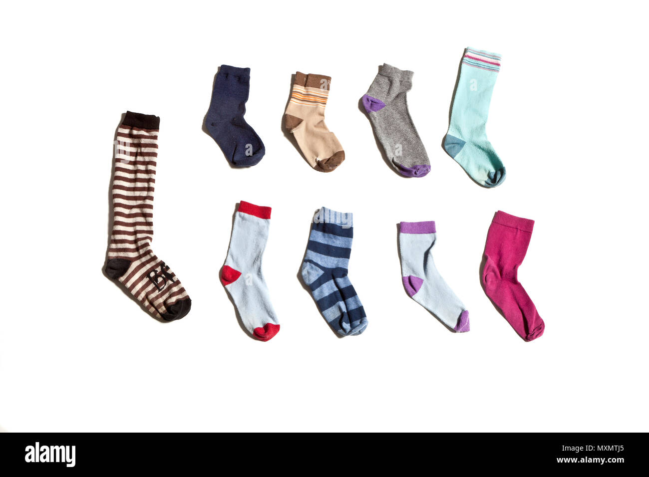 old socks, isolated on white background Stock Photo - Alamy