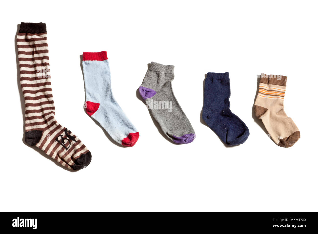 old socks, isolated on white background Stock Photo - Alamy