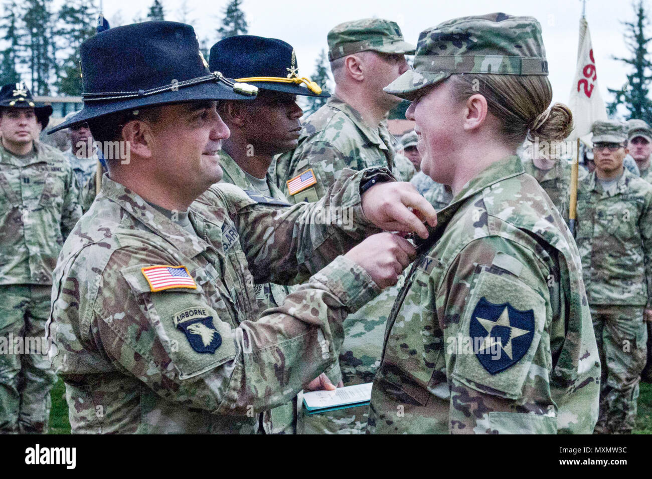 Staff Sgt. Heather King (right), a career counselor with 1st Squadron, 14th Cavalry Regiment, 1 ...