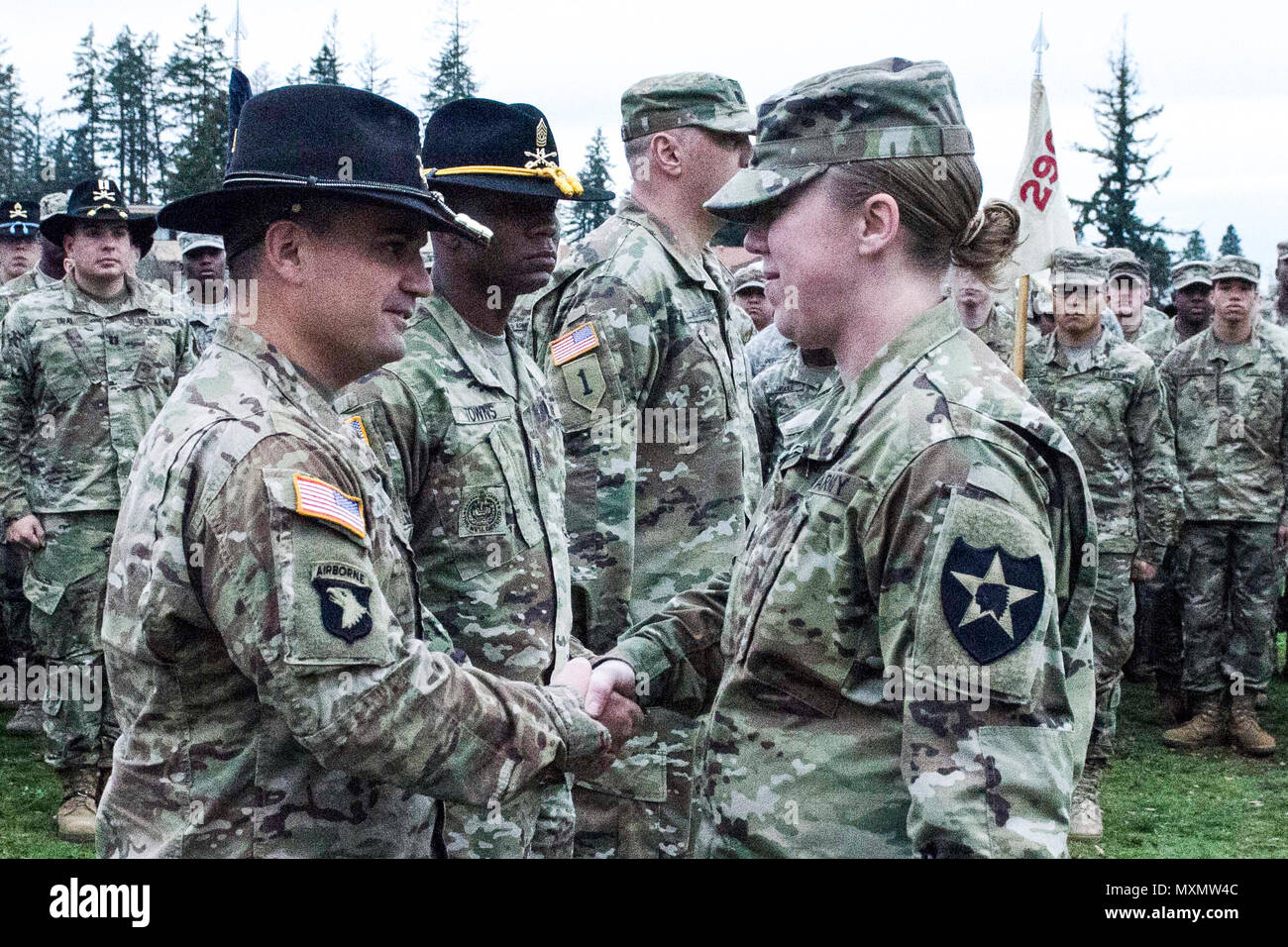 Staff Sgt. Heather King (right), a career counselor with 1st Squadron, 14th Cavalry Regiment, 1 ...