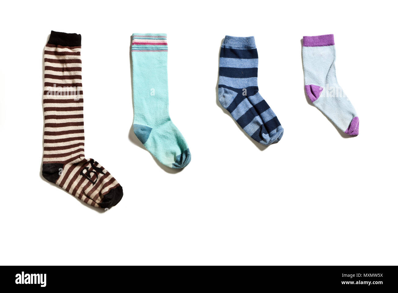 old socks, isolated on white background Stock Photo - Alamy