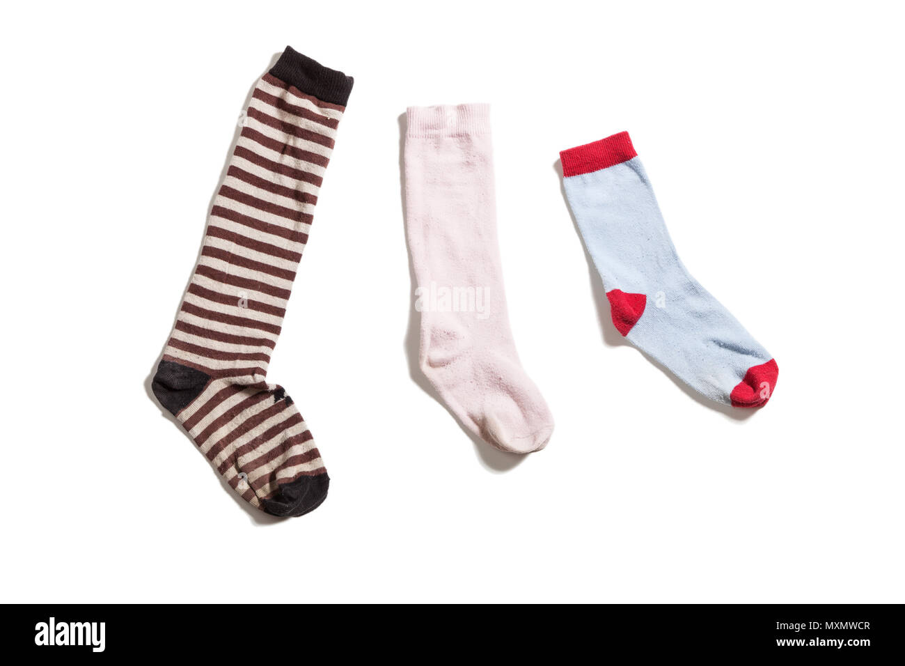 old socks, isolated on white background Stock Photo - Alamy