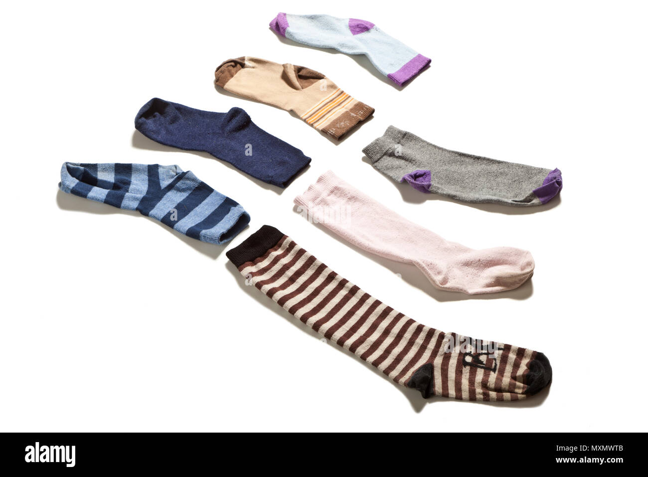 old socks, isolated on white background Stock Photo - Alamy