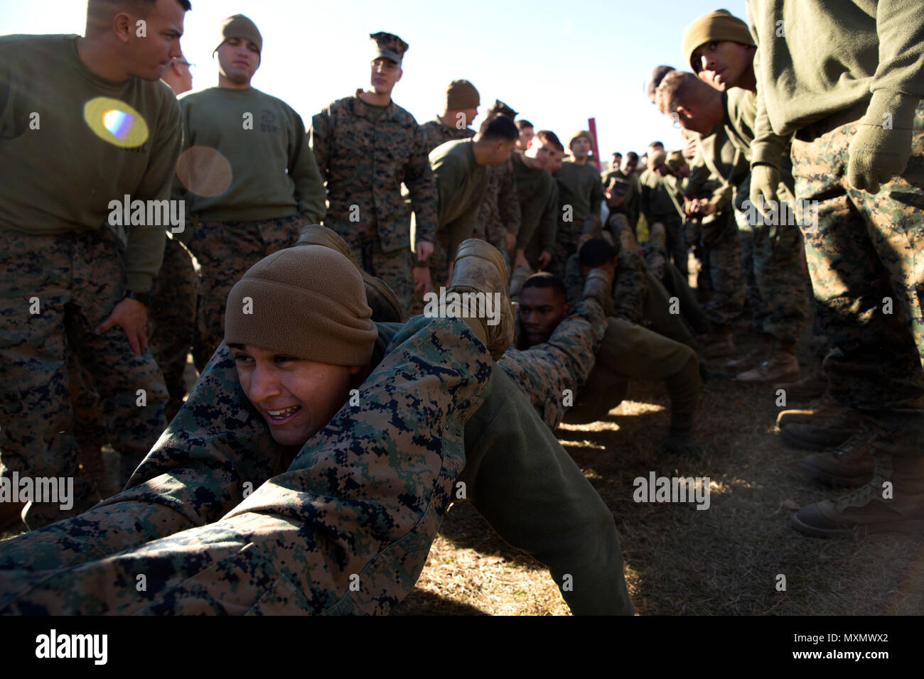 Marines do connected push-ups during a 'Teufel Hunden' challenge ...